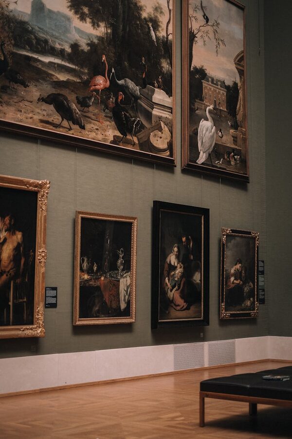 Museum visitor viewing painting