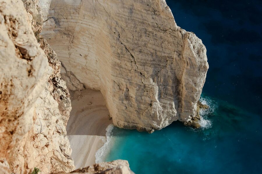 Aerial view of Navagio Beach iconic cliff and turquoise water on Zakynthos