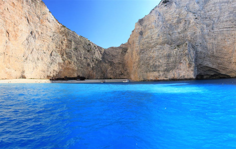 Rusting hull of the MV Panagiotis shipwreck on Navagio Beach