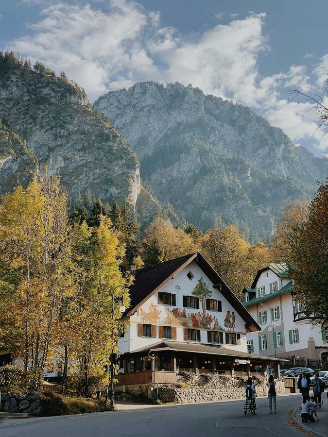 Autumn view of a Bavarian village house against the Alps in Schwangau
