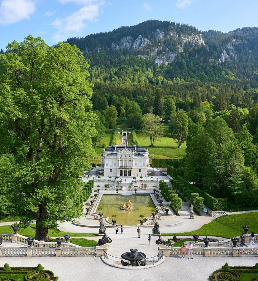 Linderhof Palace in Bavaria with gardens and mountainous backdrop