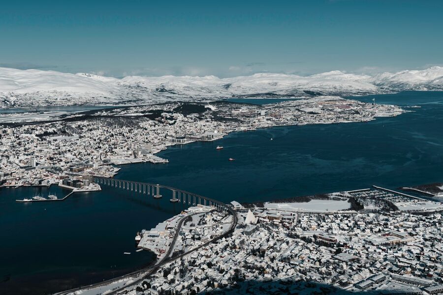 Tromsø harbor boats in winter twilight