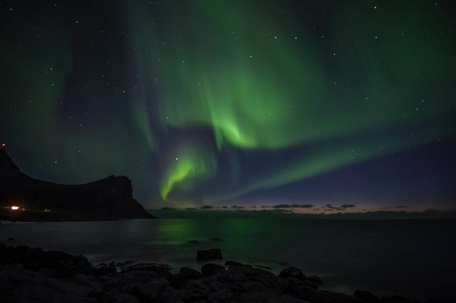 Aurora borealis over a road in the Arctic