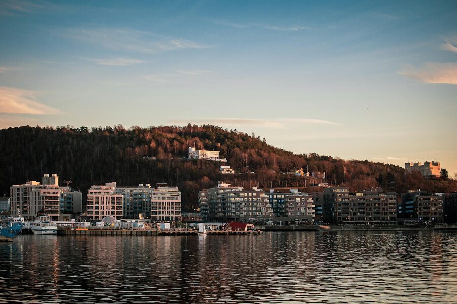 Oslo city skyline at sunset from the waterfront