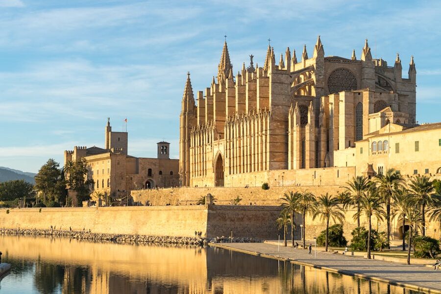 Palma Cathedral reflected in harbour water