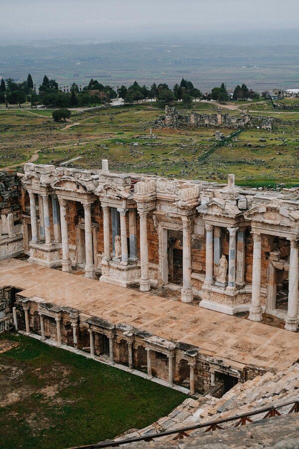 Aerial view of the ancient Hierapolis amphitheater and surrounding ruins in Pamukkale