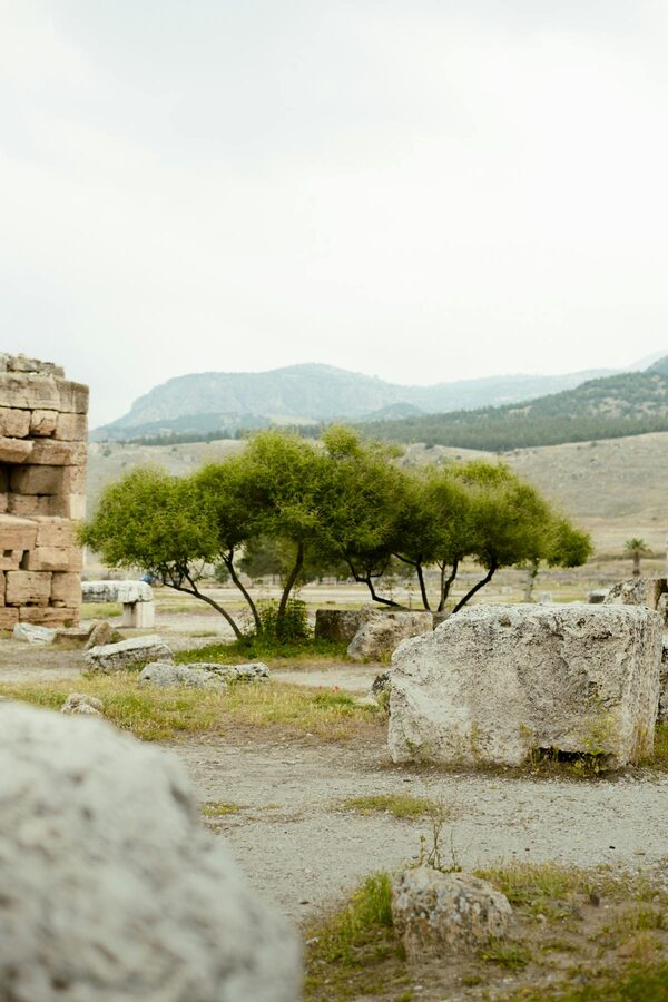 Ancient ruins of Hierapolis with green surroundings in Pamukkale Turkey
