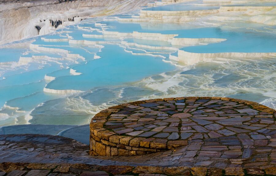 Close-up of turquoise thermal water filling terraced pools at Pamukkale