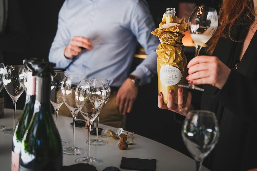 Group of people tasting champagne at a producer in the Champagne region of France
