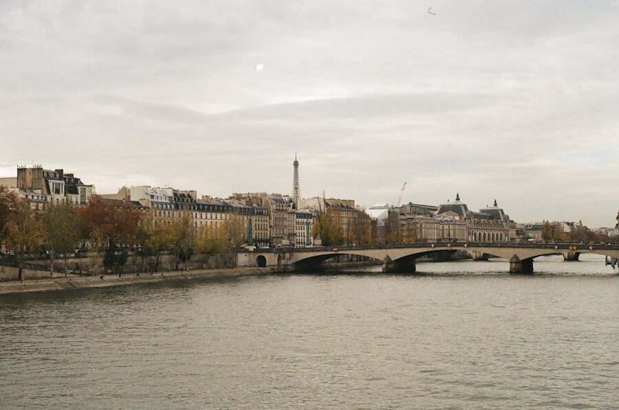The Eiffel Tower alongside classic Parisian architecture and the Seine
