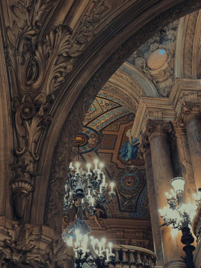 Ornate ceiling and arches inside the Palais Garnier