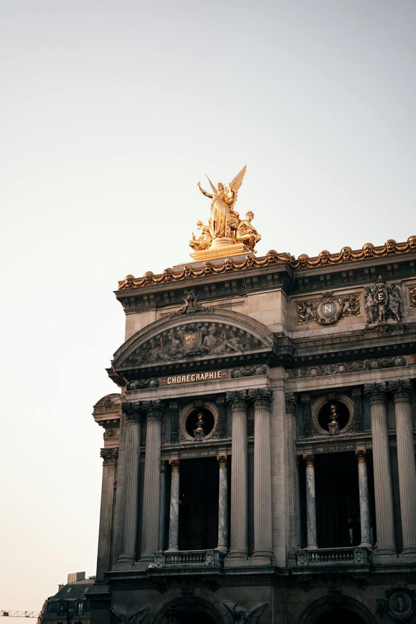 Gilded statues on the Palais Garnier exterior