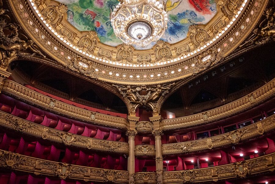 Luxurious opera theatre interior with gold details and chandelier