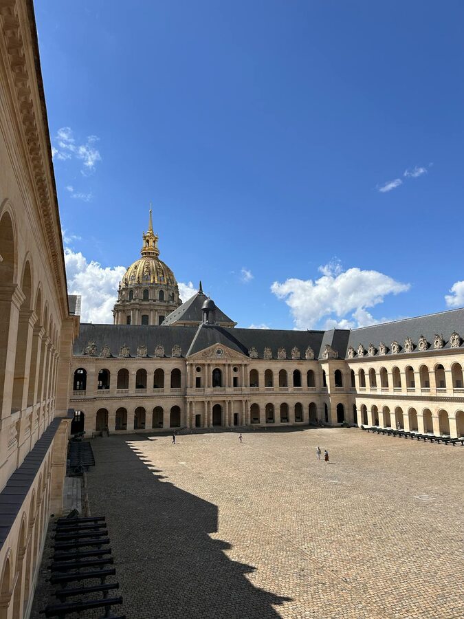 Historic courtyard and dome of Les Invalides in Paris