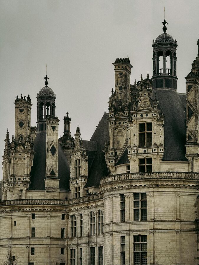 Detailed view of the Renaissance stonework and ornamentation on Château de Chambord