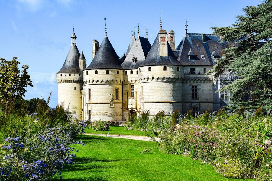 Château de Chaumont surrounded by formal gardens with trimmed hedges