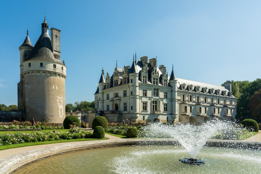 Château de Chenonceau with fountain in the formal garden and Renaissance architecture beyond