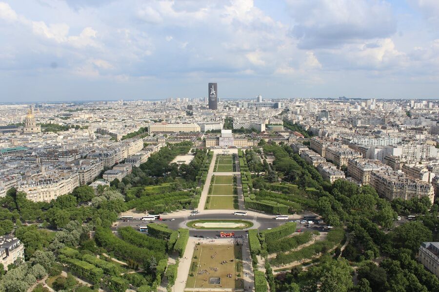 Aerial view of the Champ de Mars park and Eiffel Tower from above Paris