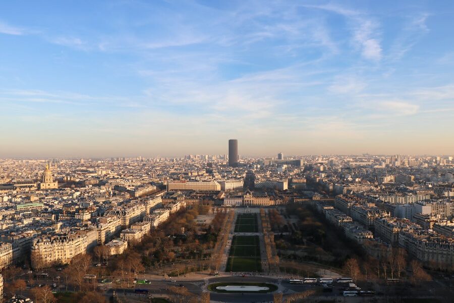 Paris skyline at sunset from above showing the full city spread