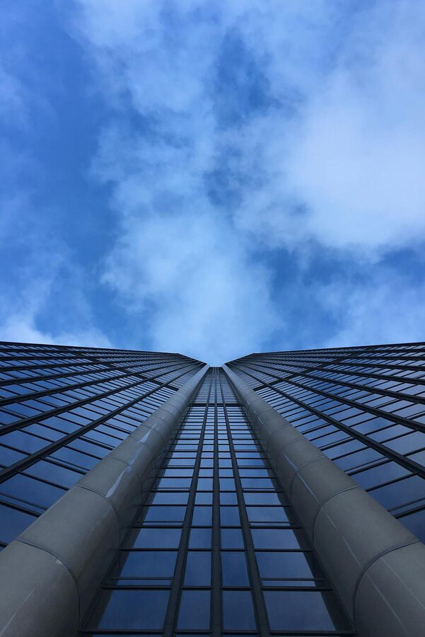 Montparnasse Tower shot from below against a clear sky