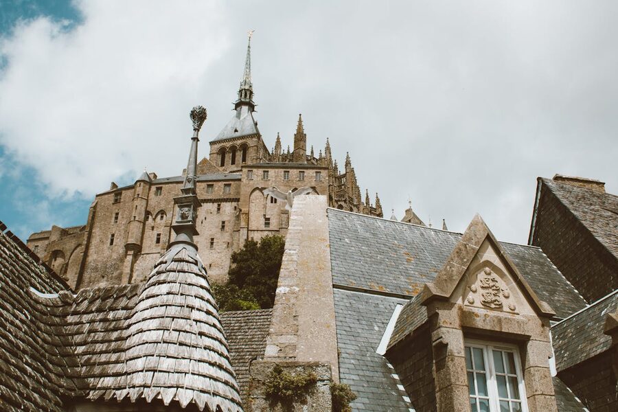 Detailed view of Mont Saint-Michel's Gothic architecture and buttresses