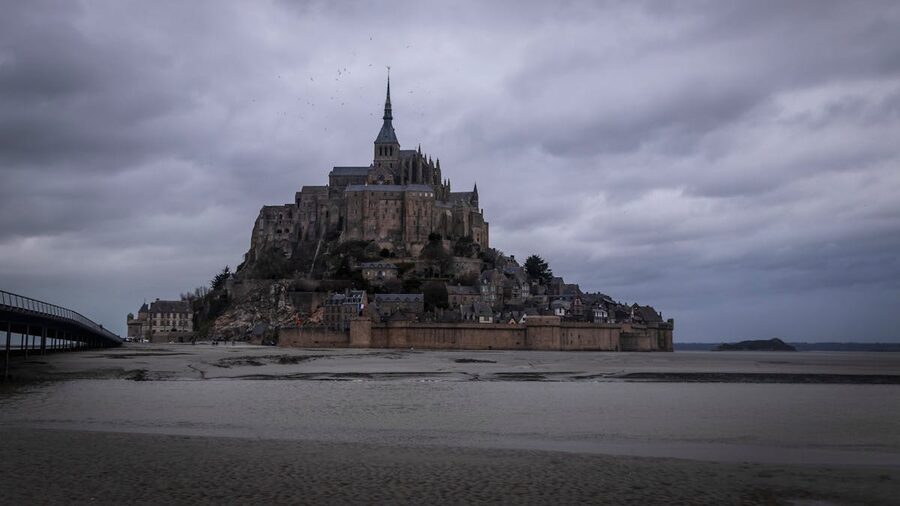 Wide view of Mont Saint-Michel from across the bay at low tide
