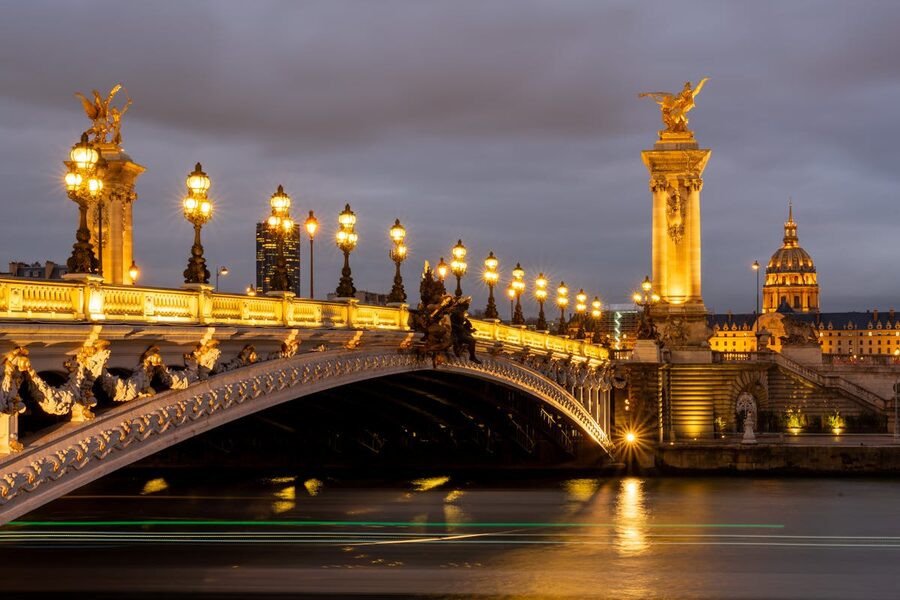 Illuminated Pont Alexandre III bridge in Paris at night