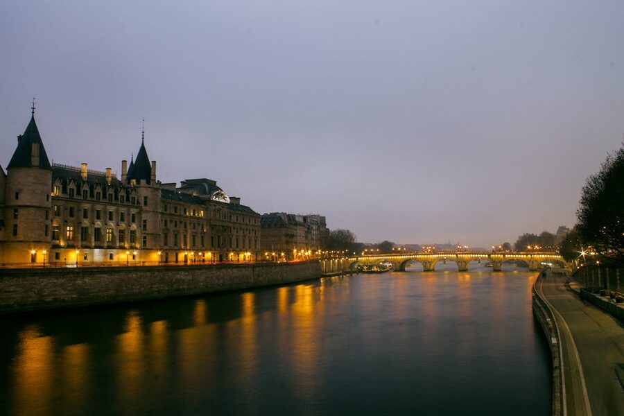 Seine River at dusk with Parisian architecture and bridges