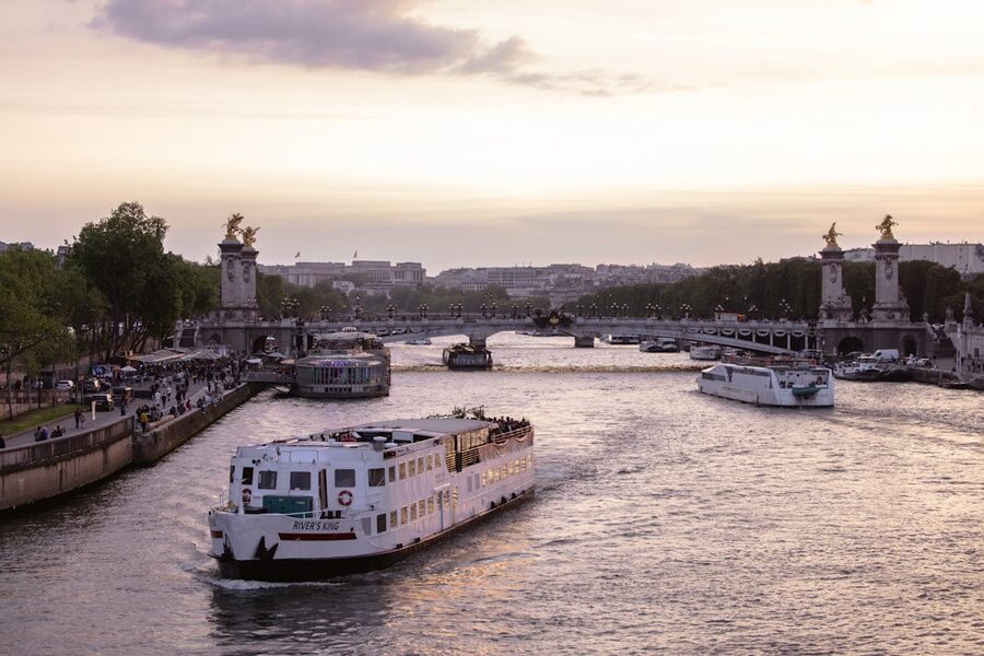 Pont Alexandre III bridge at sunset over the Seine River in Paris