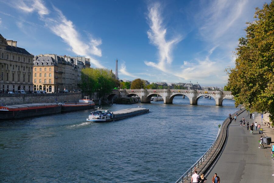 Eiffel Tower and Seine River with historic buildings along the bank