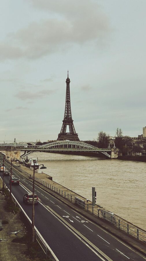 Parisian street with the Eiffel Tower visible in the distance