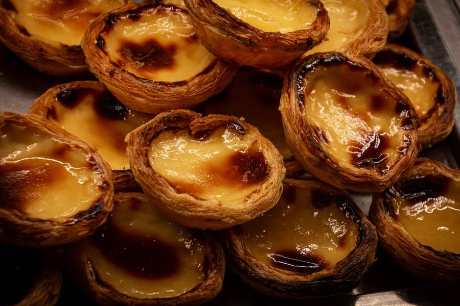 Display of fresh pastel de nata at a Portuguese bakery