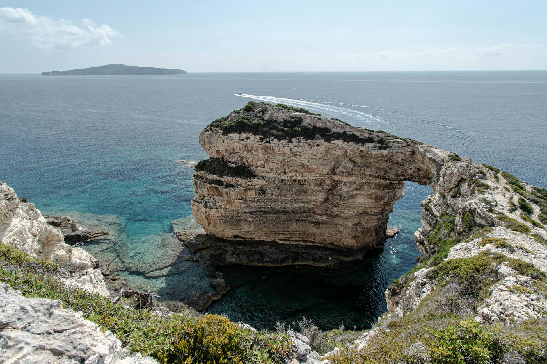 Rock arch formation along the Paxos coastline