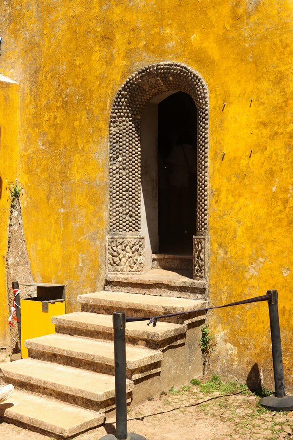 Textured stone archway and doorway at Pena Palace in Sintra