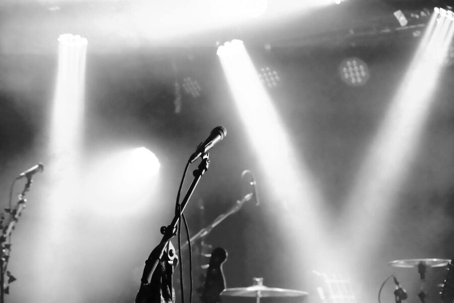 Microphone on stage in black and white