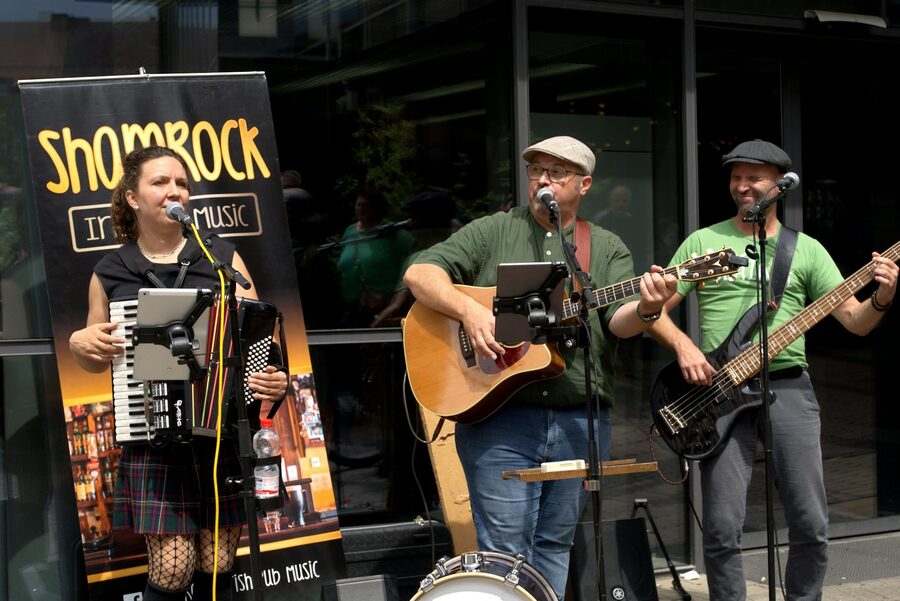 Live Irish music performance outdoors with band