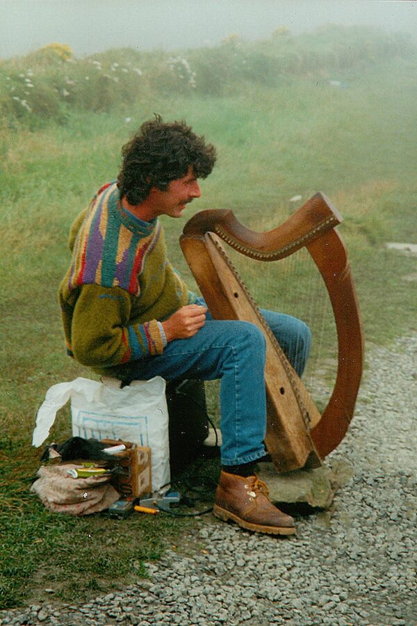 Irish musician with harp in County Clare