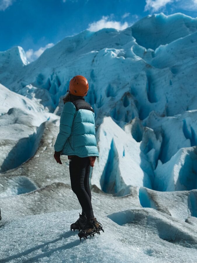 Close-up of glacier surface showing deep crevasses and textures