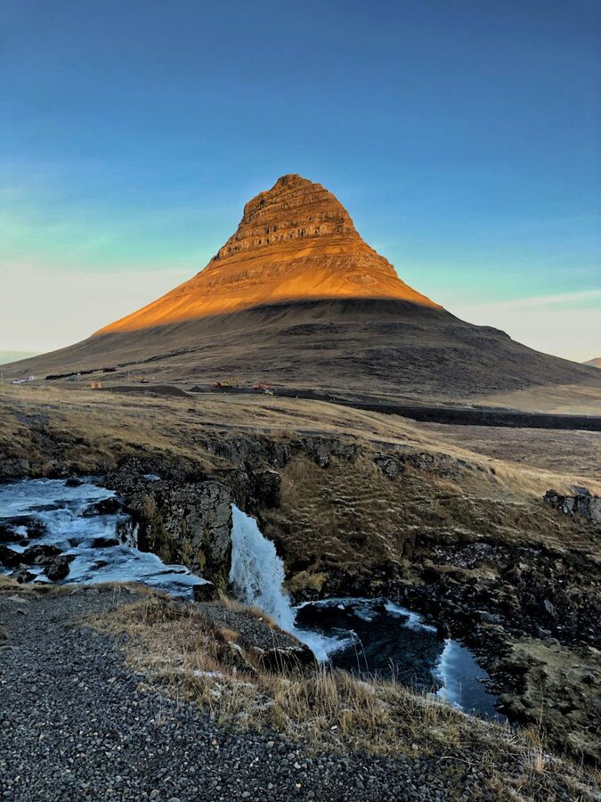 Kirkjufell mountain and Kirkjufellsfoss waterfall side by side