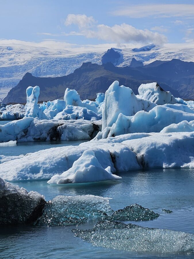 Panoramic view of Jokulsarlon glacier lagoon with icebergs