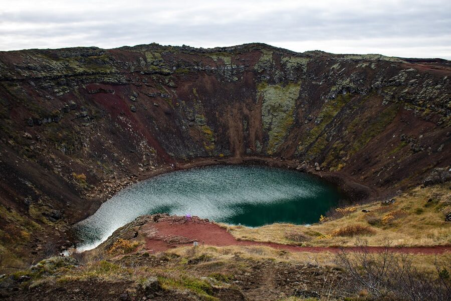 Volcanic crater with aquamarine lake in Iceland