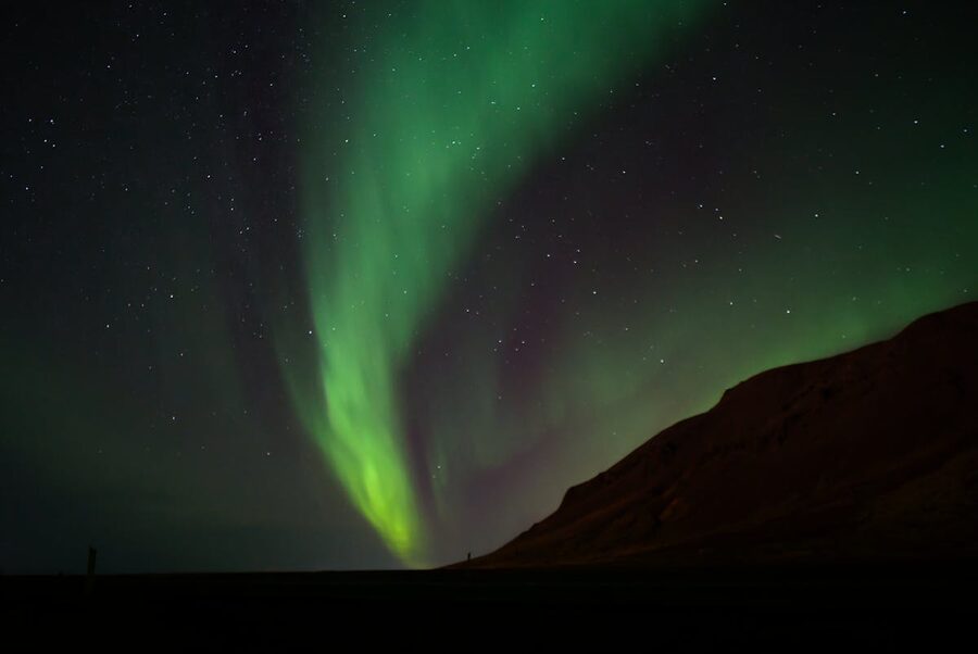 Aurora borealis illuminating night sky over Selfoss Iceland