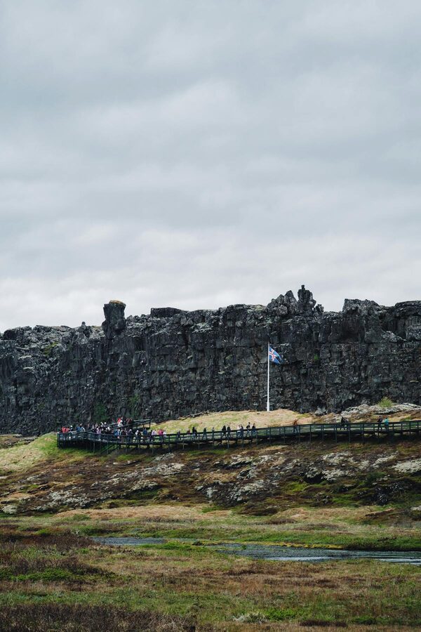 Tourists walking boardwalk at Thingvellir National Park