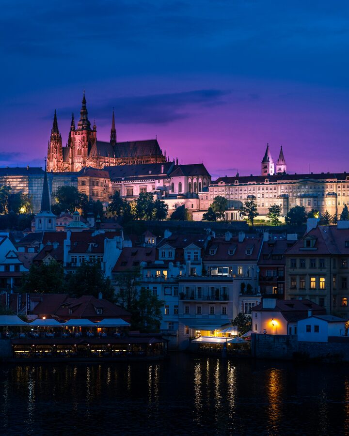Prague evening river lights