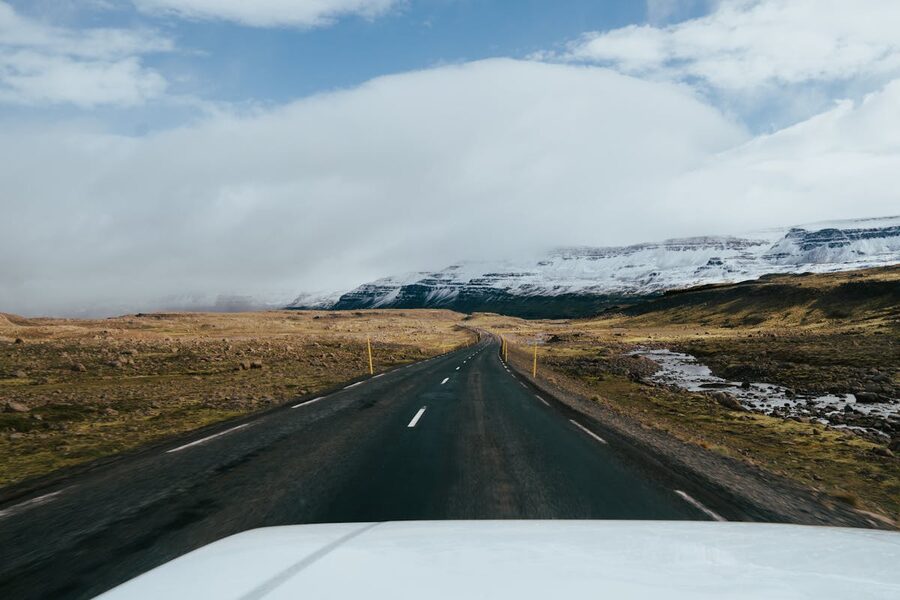 Scenic road through Iceland with snow-capped mountains