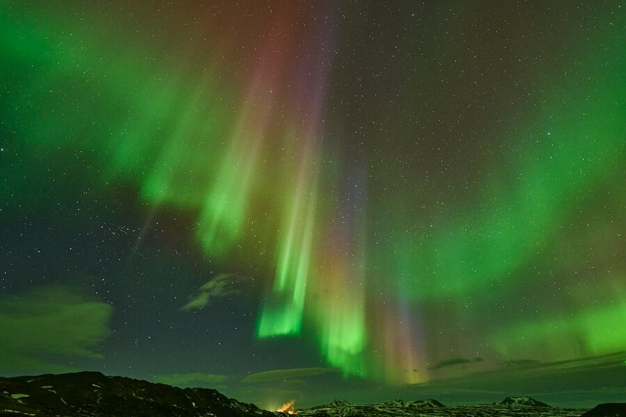Aurora borealis dancing over Iceland at night