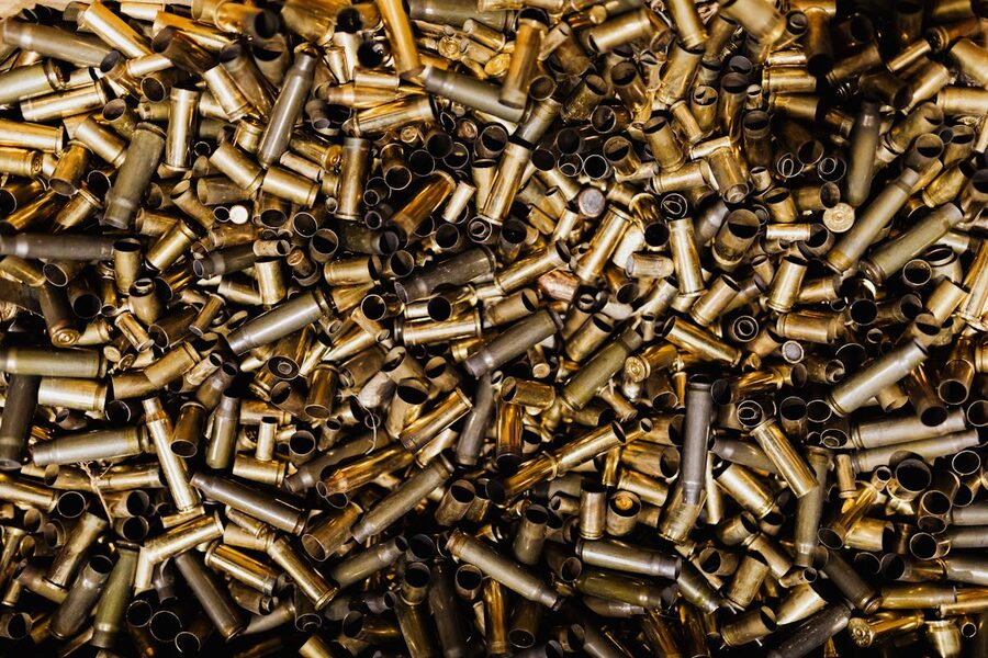 Pile of spent brass bullet casings