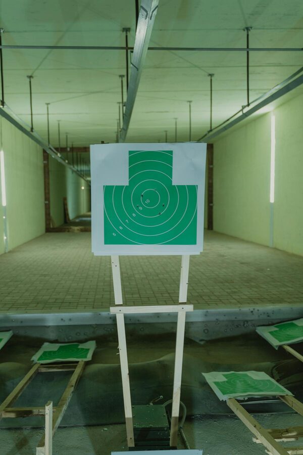Indoor shooting range with target lanes stretching into the distance