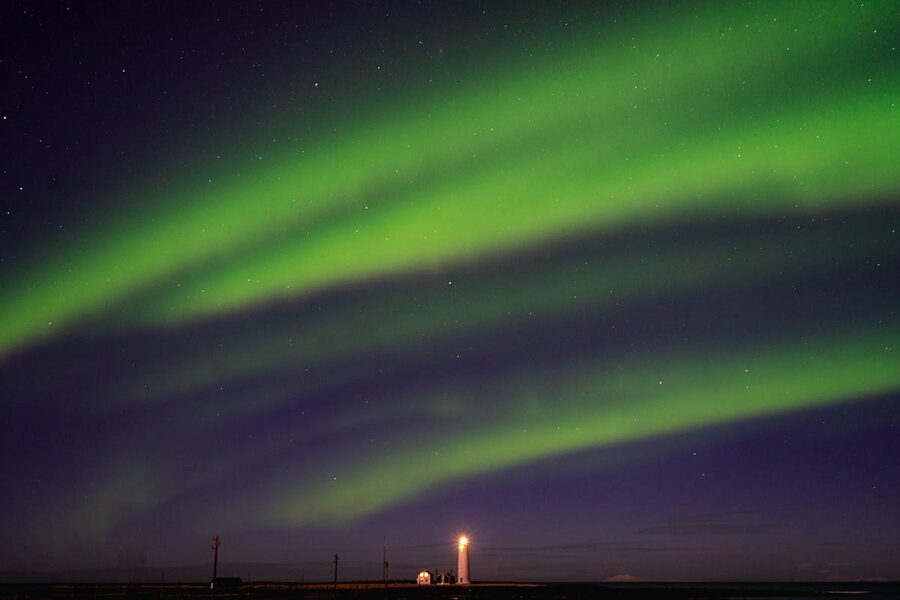 Aurora over Grotta lighthouse Seltjarnarnes Iceland