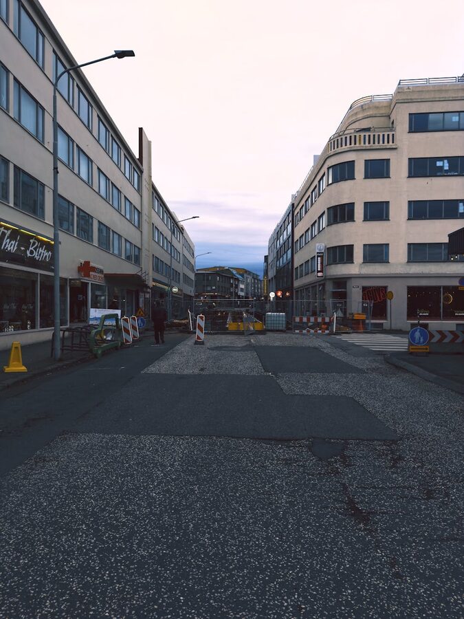 Hallgrimskirkja church tower rising above Reykjavik rooftops
